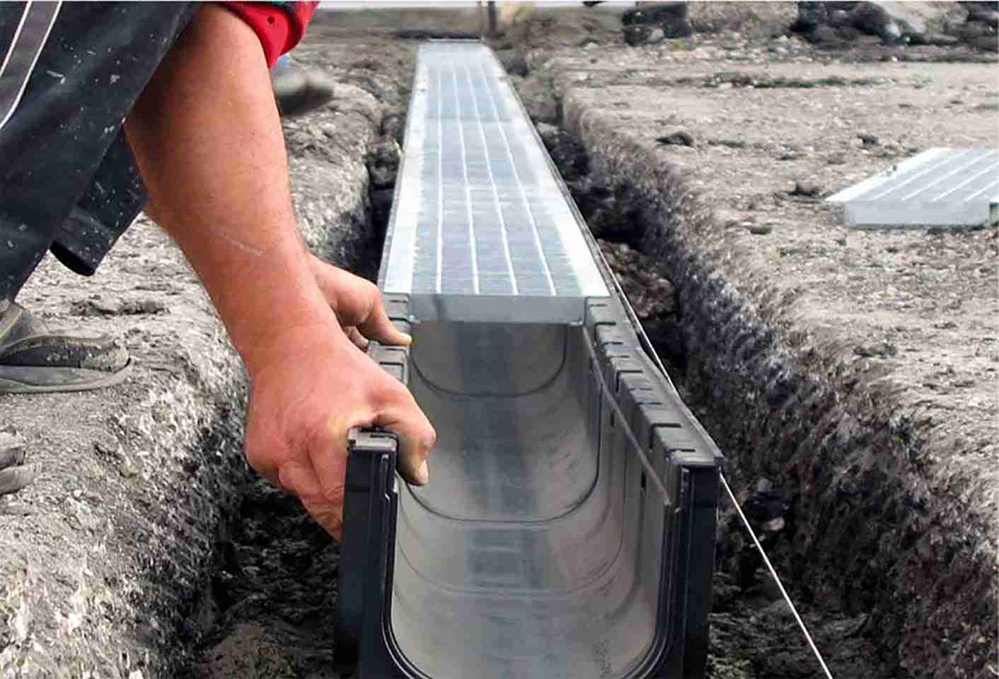 What is surface drainage and how does it work